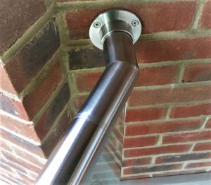 Handrail joined to bespoke welded angle - Balcony Installations
